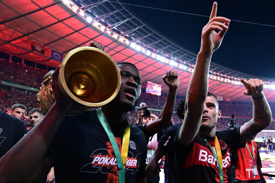 Xhaka scores as 10-man Leverkusen lift German Cup to claim a first double